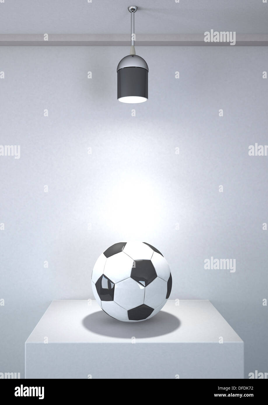 Football under room light Stock Photo - Alamy