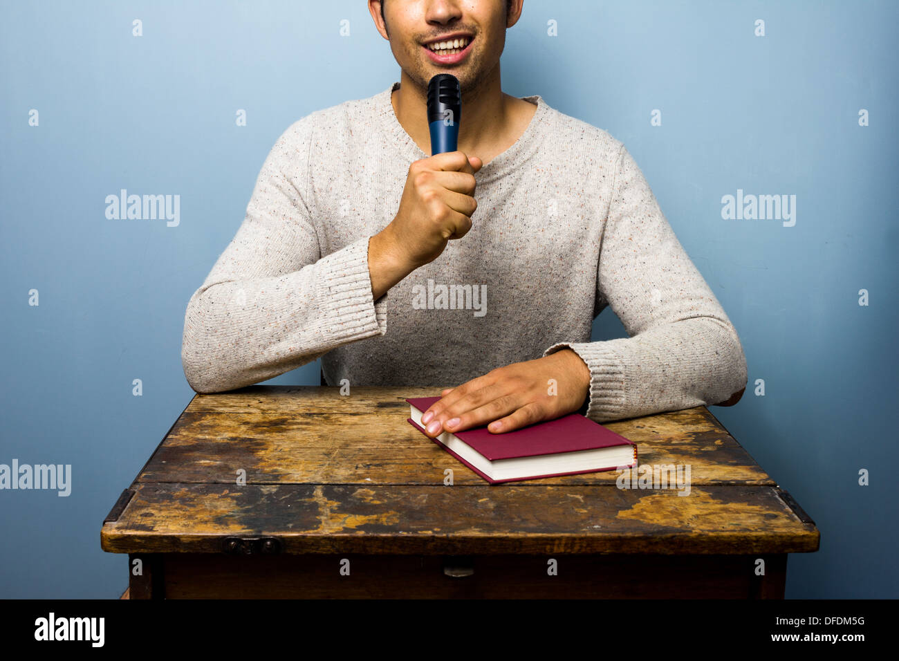 Books microphone hi-res stock photography and images - Alamy