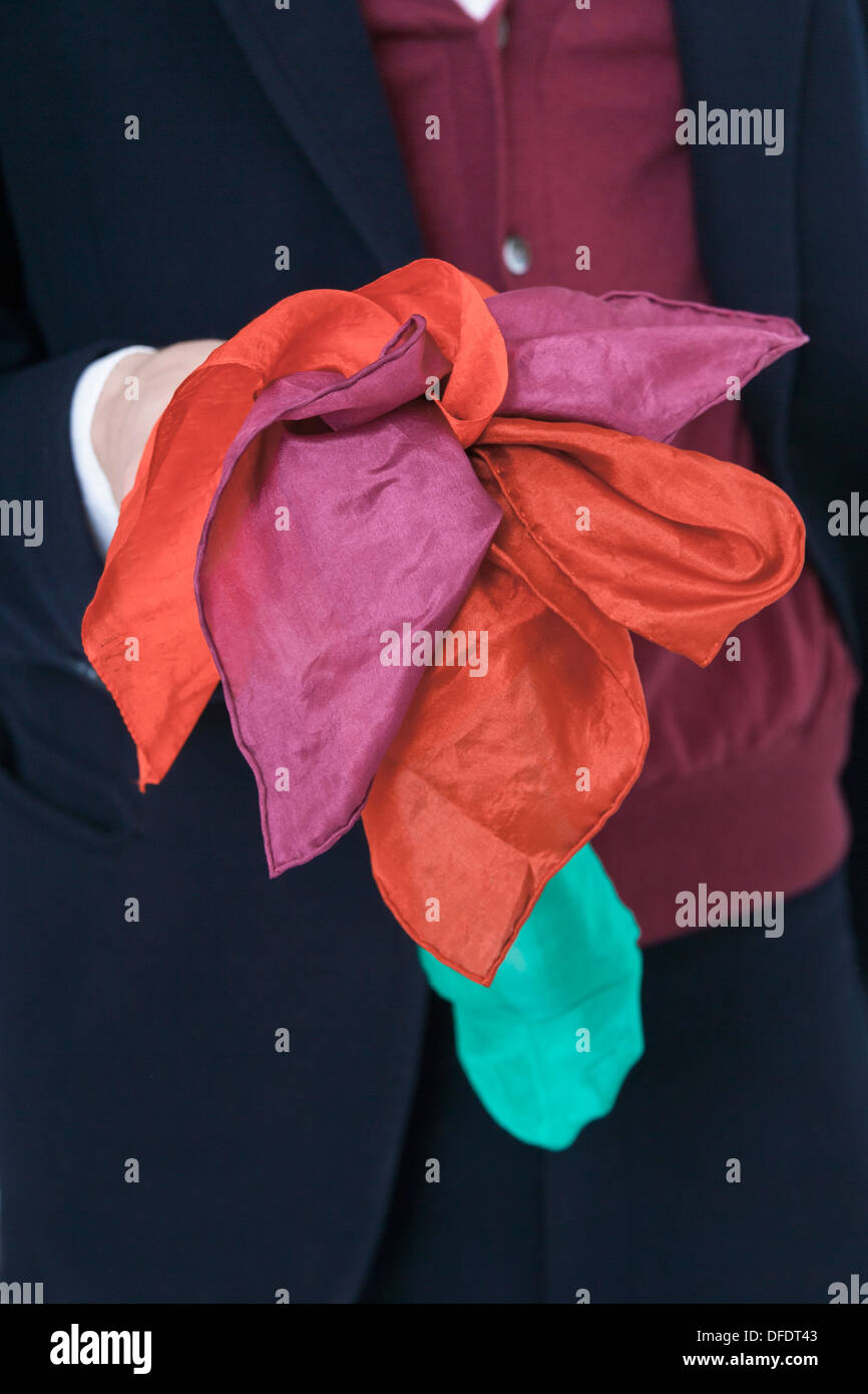 Young man showing magic with handkerchief, close up Stock Photo - Alamy