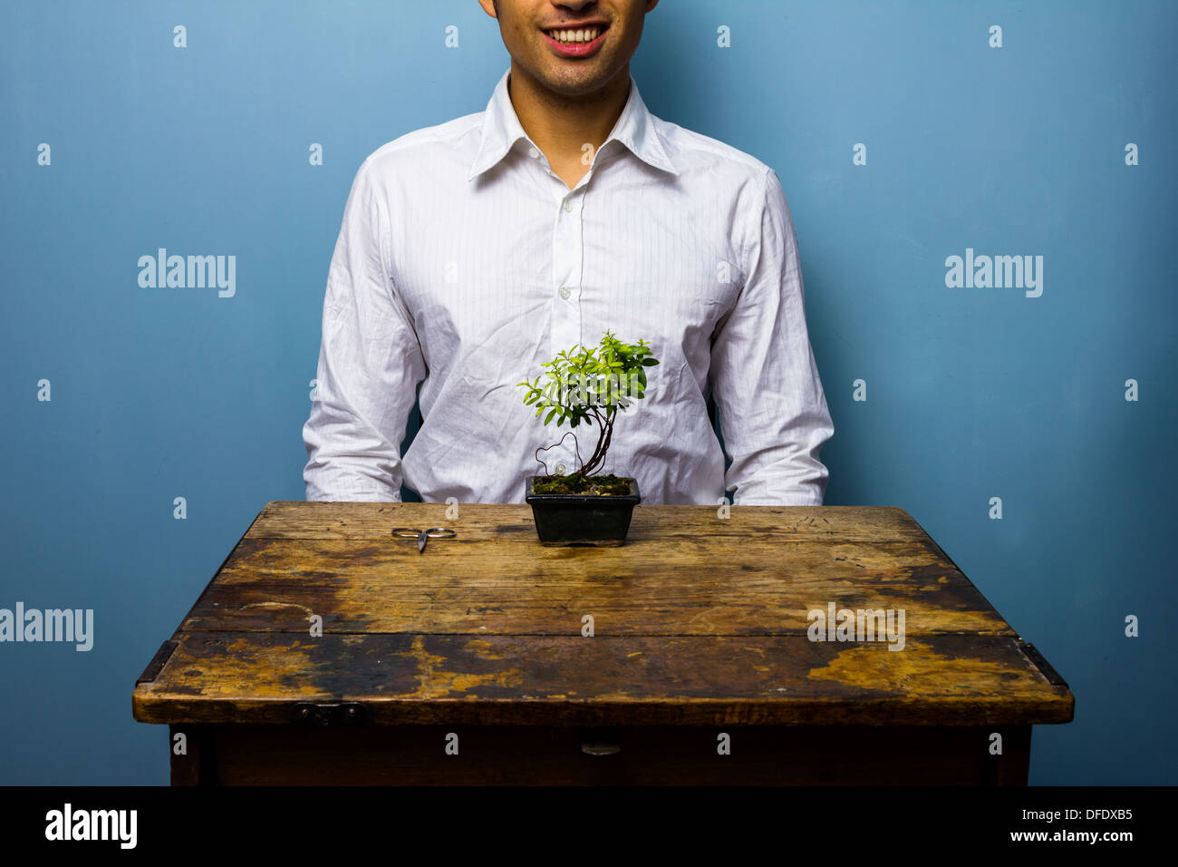 Man bonsai hi-res stock photography and images - Alamy
