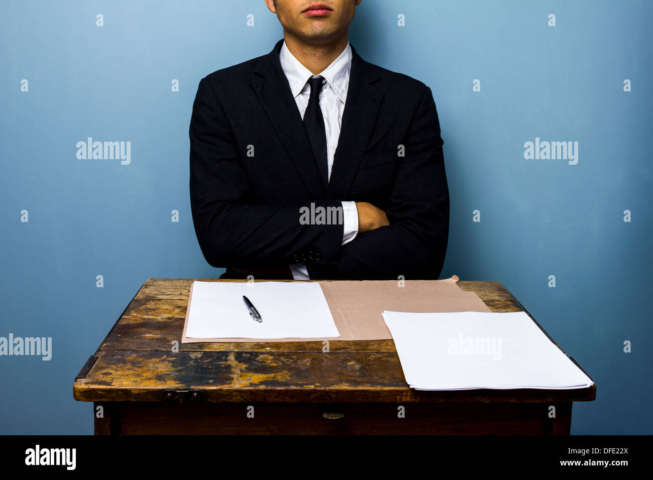 Young businessman is refusing to sign contract Stock Photo - Alamy