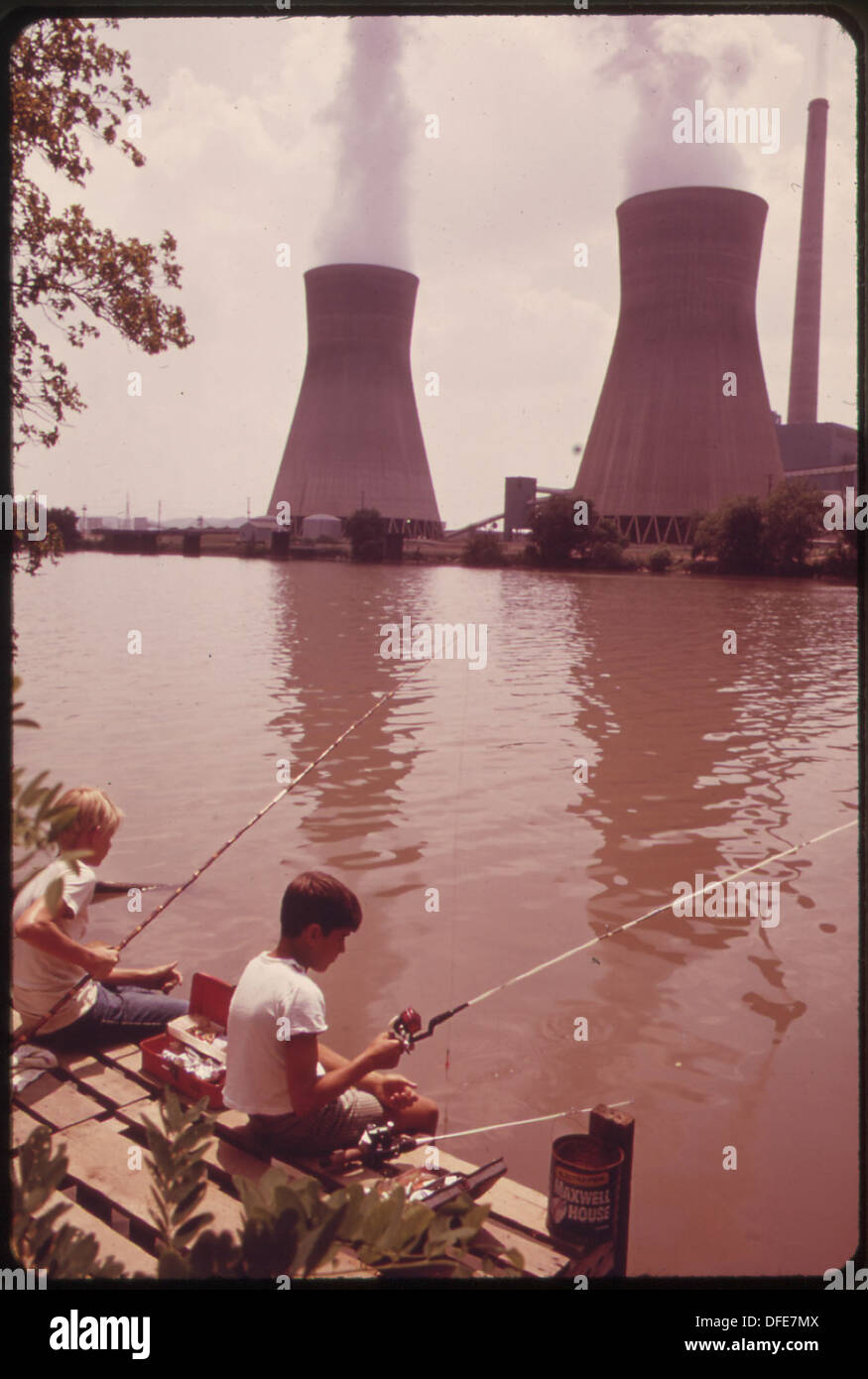 Boys fish in the Kanawha River at Poca, with steam rising from the ...