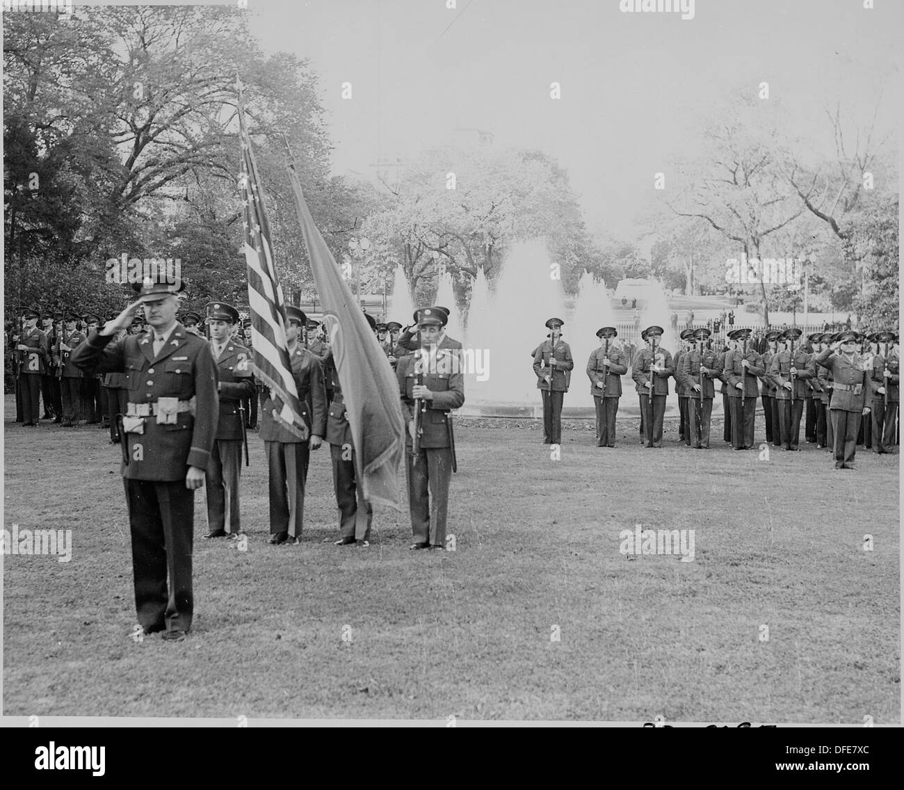 File Photograph of color guard and troops on the White House lawn ...