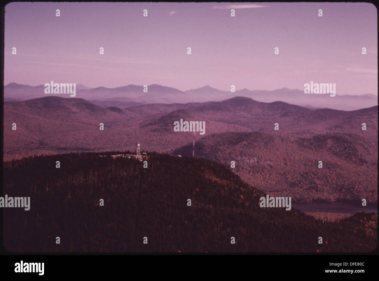 FIRE AND RADAR TOWERS ATOP BLUE MOUNTAIN, WITH A RANGE OF HIGH PEAKS ...