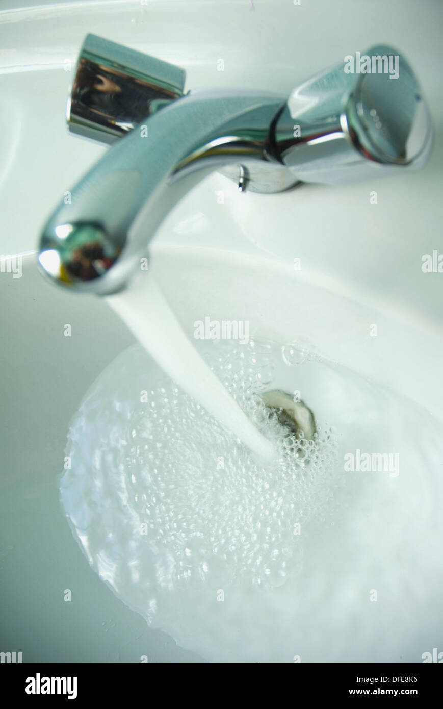 Water wasting from tap hi-res stock photography and images - Alamy