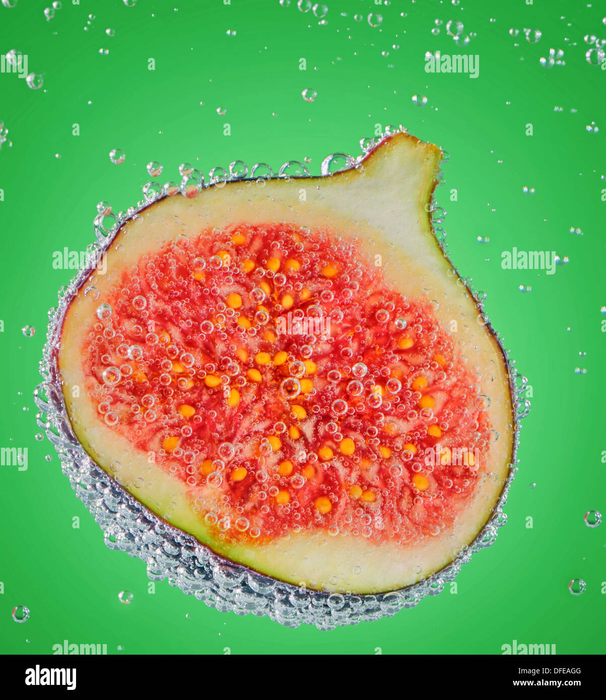 fresh fig cut in half immersed in mineral water Stock Photo - Alamy