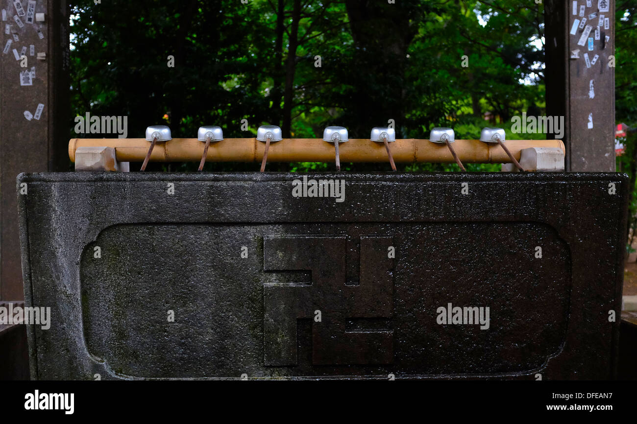 chozuya or temizuya. Shinto water ablution pavilion. Nezu shrine Stock ...