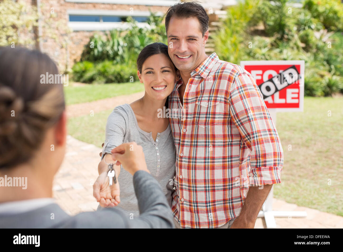 Mature woman giving new hi-res stock photography and images - Alamy