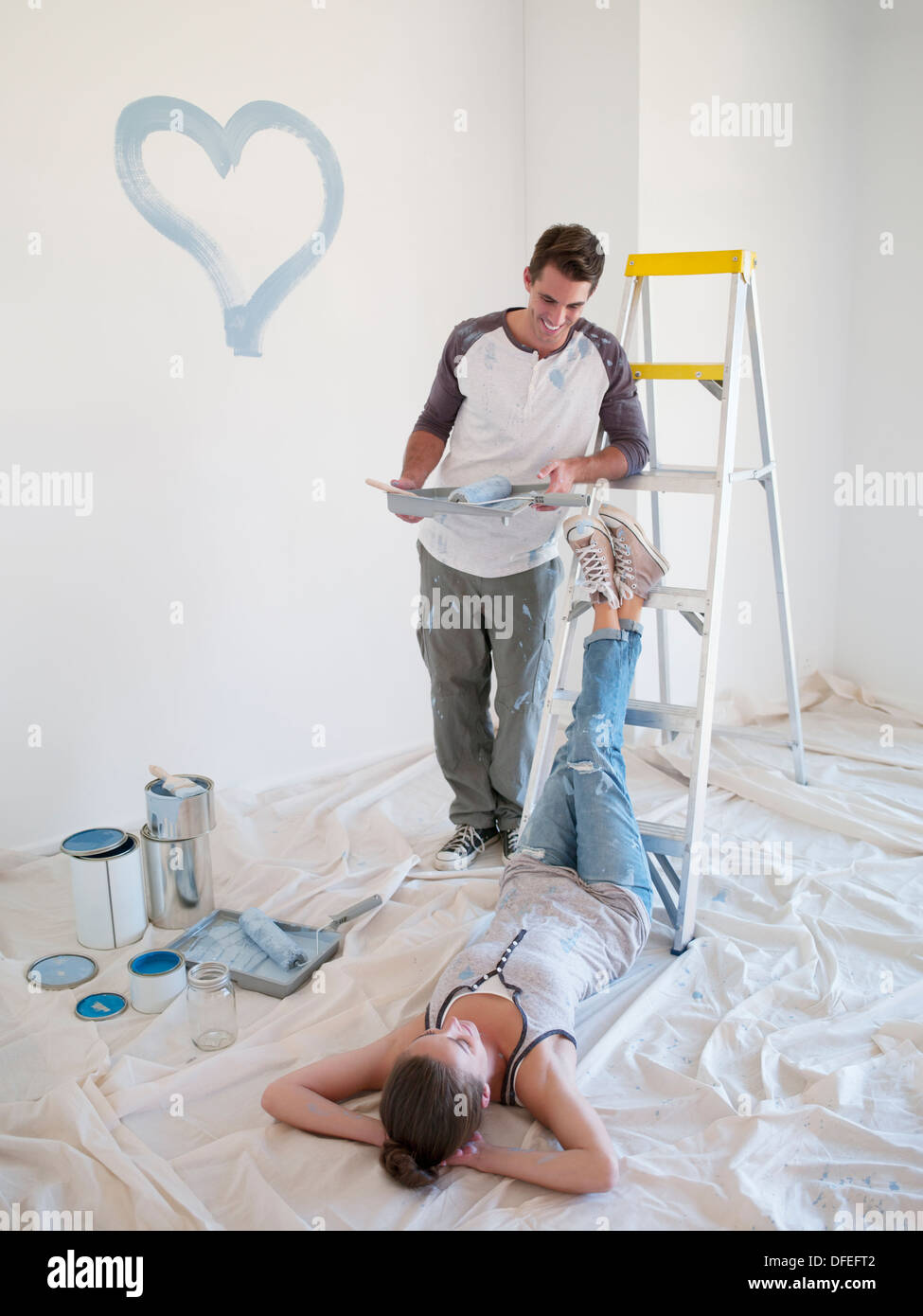 Man up ladder painting hi-res stock photography and images - Alamy