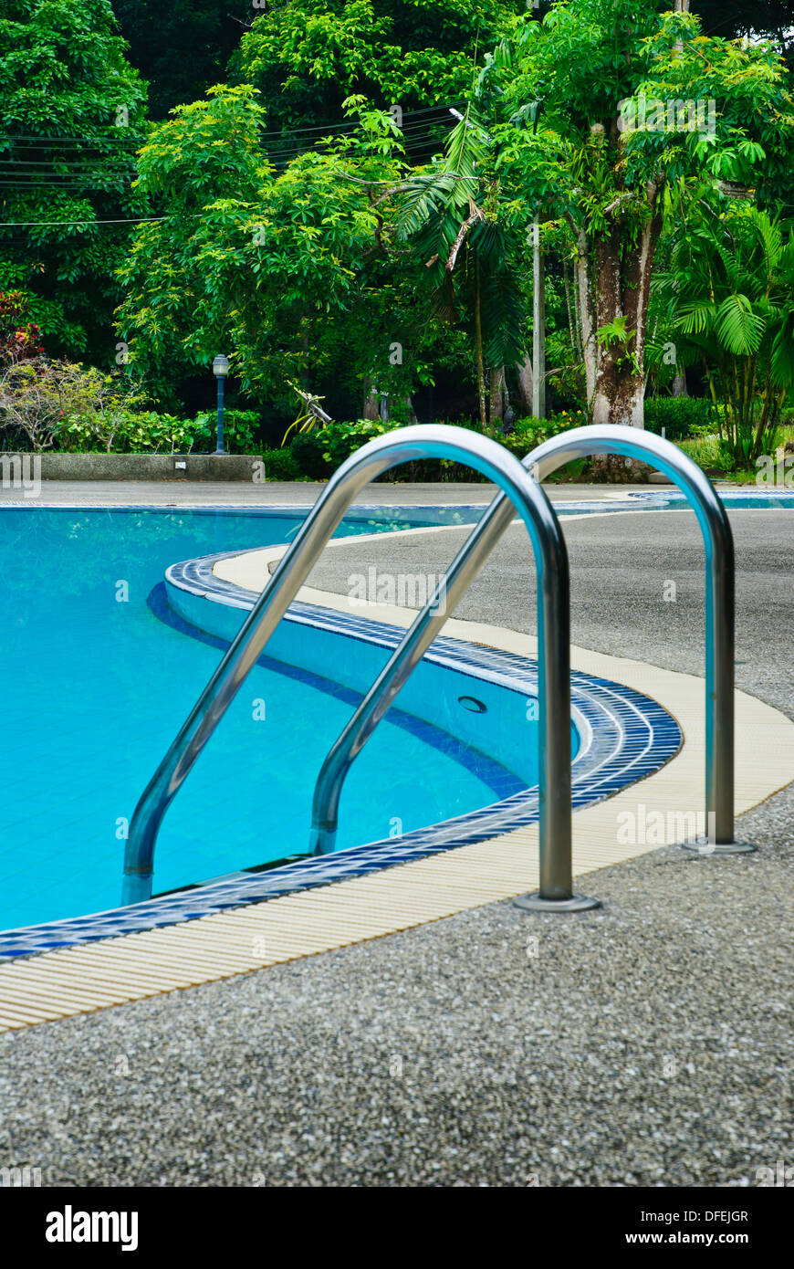 swimming pool transparent water and surrounded by nature Stock Photo ...