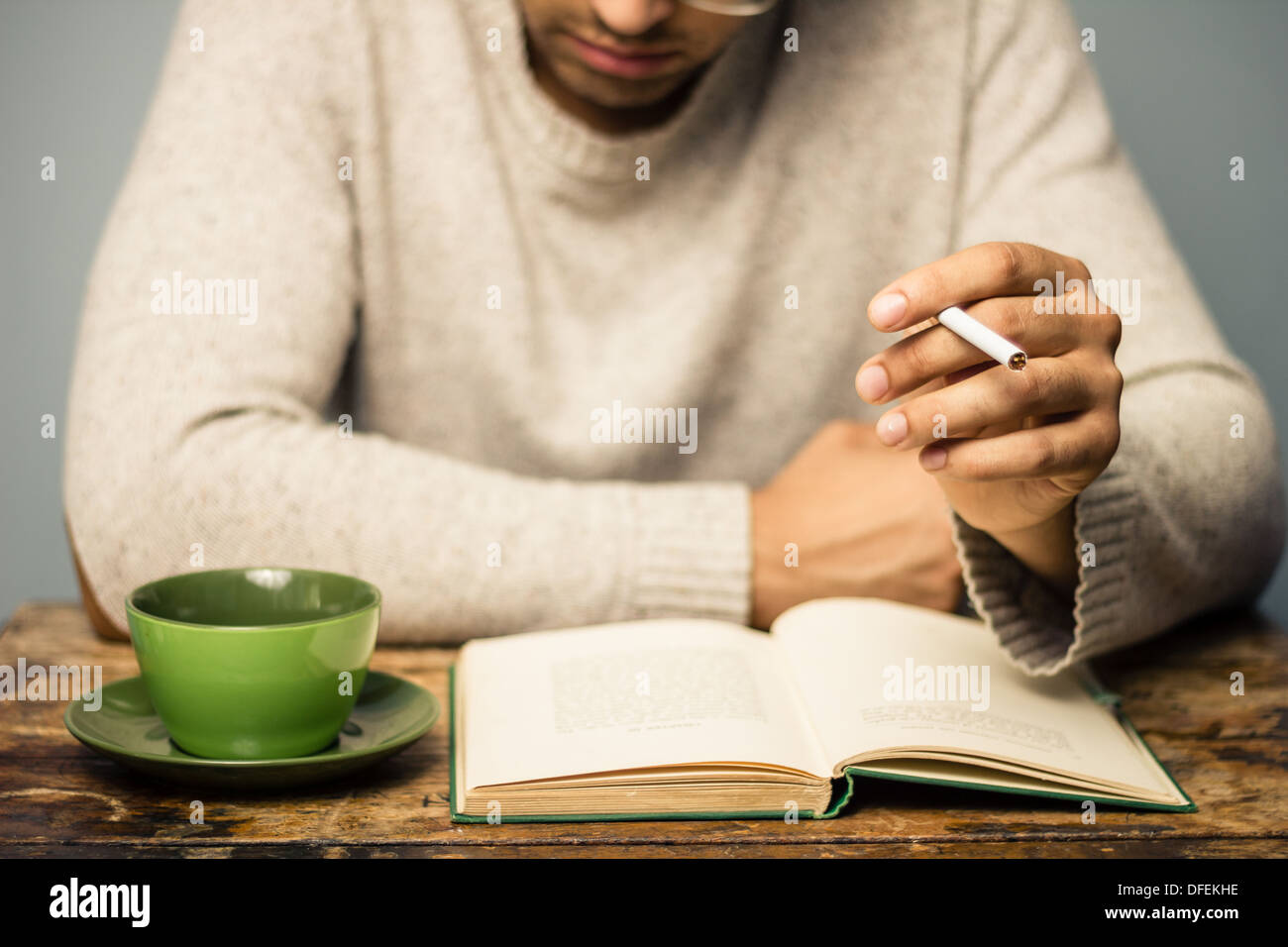 Man smoking cigarette drinking coffee hi-res stock photography and ...