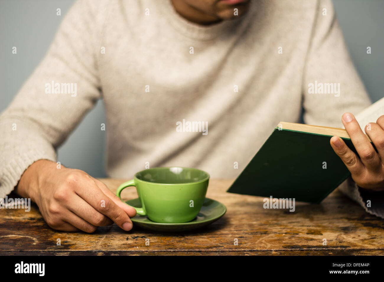 Man reading in a cafe hi-res stock photography and images - Alamy