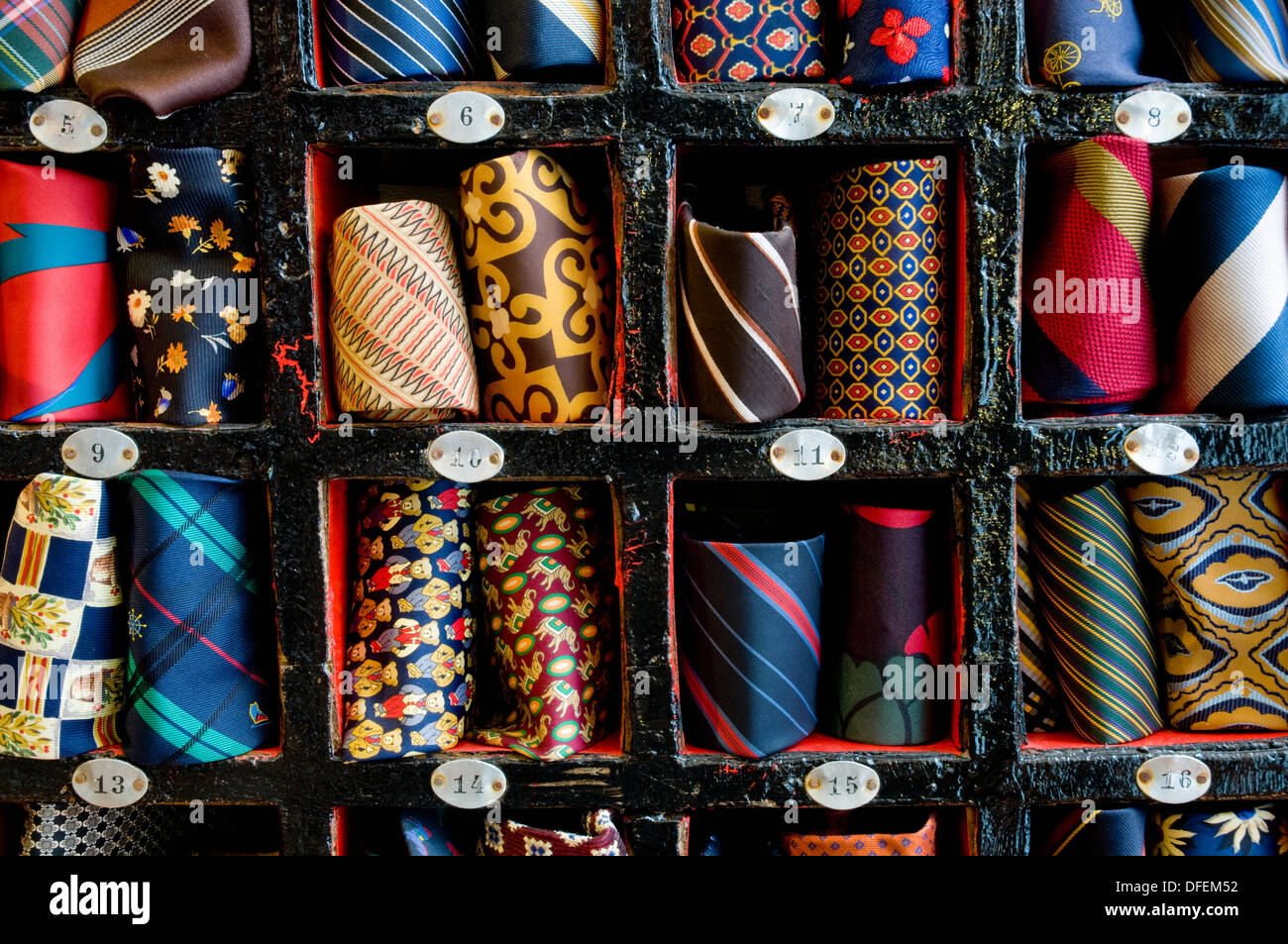 A selection of colourful vintage silk ties displayed in a hotel key box ...