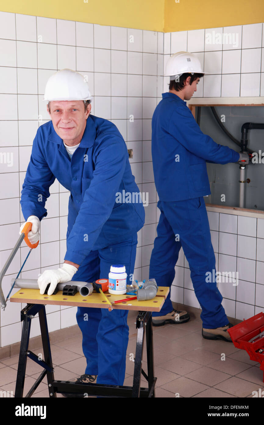 Team of plumbers hi-res stock photography and images - Alamy