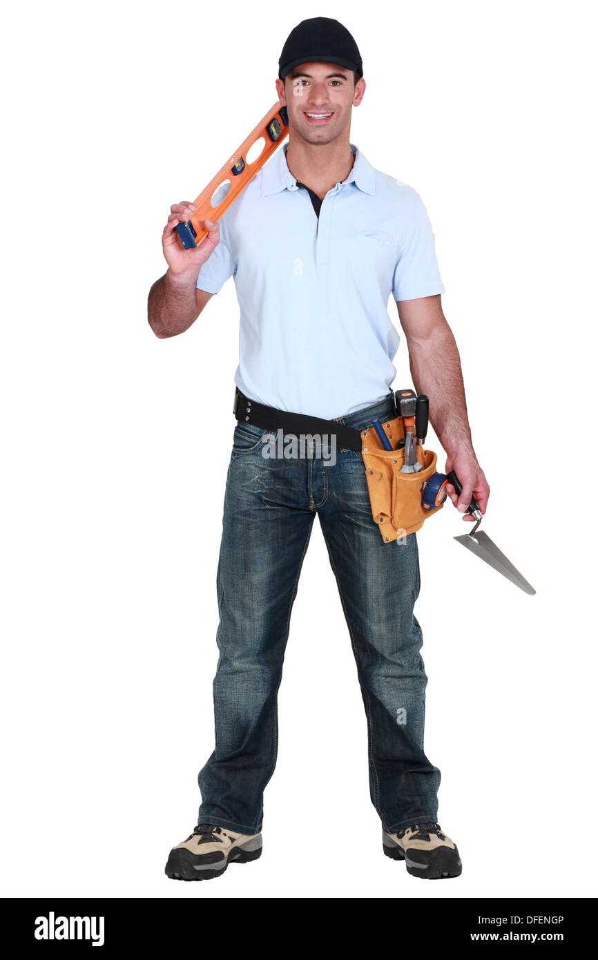 portrait of handsome carpenter carrying ruler Stock Photo - Alamy