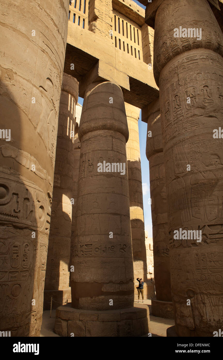 Photographer among the columns within the Great Hypostyle Hall at ...