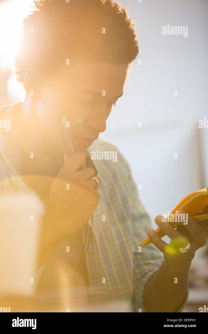 Man using mobile phone back of head hi-res stock photography and images ...