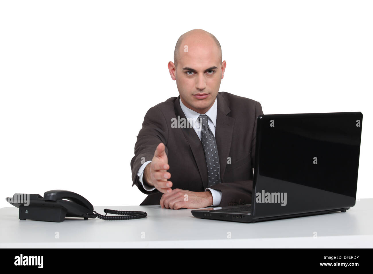 A businessman greeting his client Stock Photo - Alamy