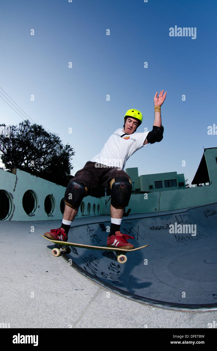 skateboard athlete perfoming tricks at public skate park at Sao ...