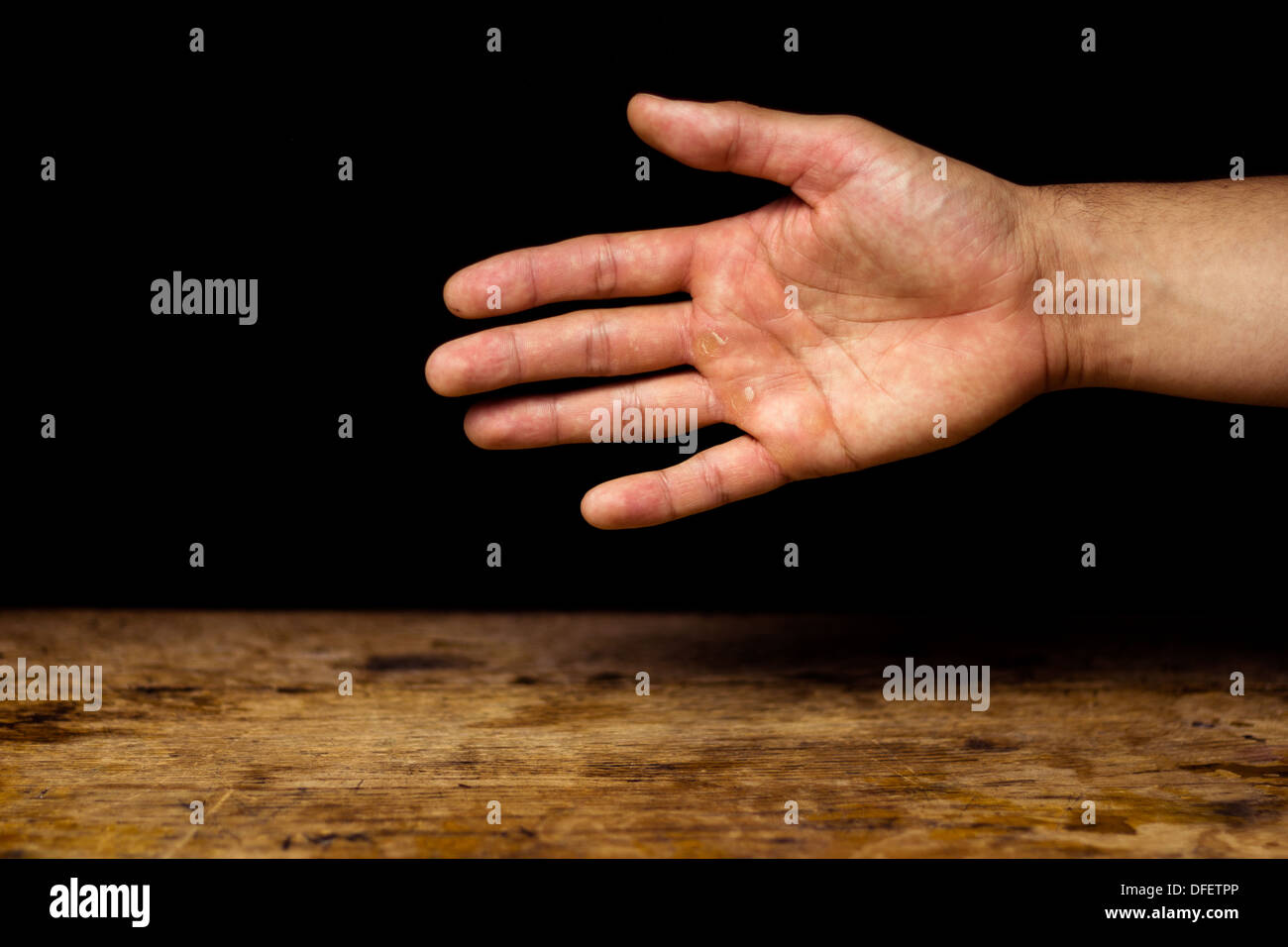 Male hand offering handshake Stock Photo - Alamy