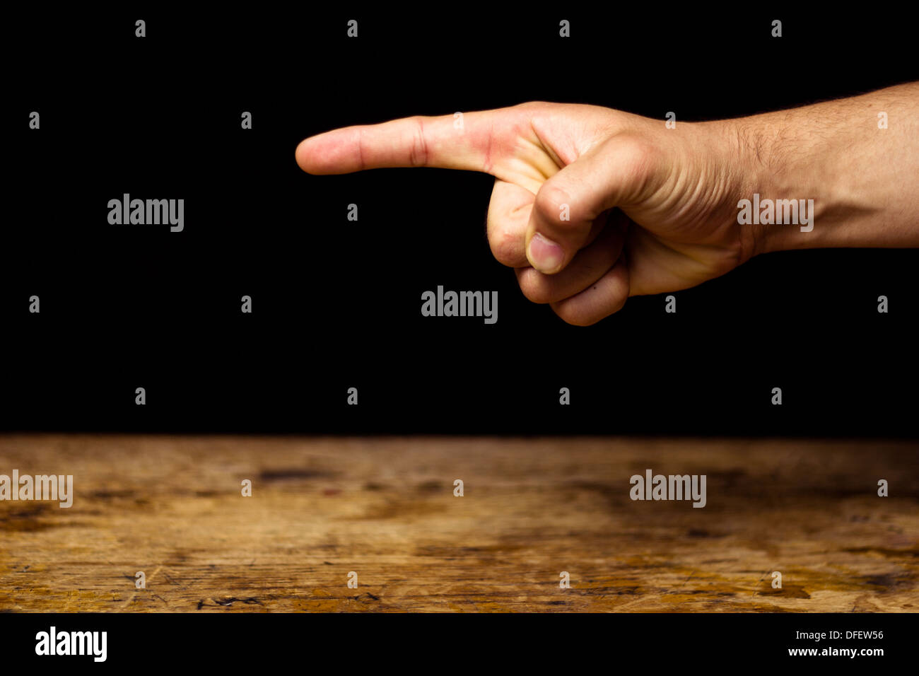 Male hand pointing with index finger Stock Photo - Alamy