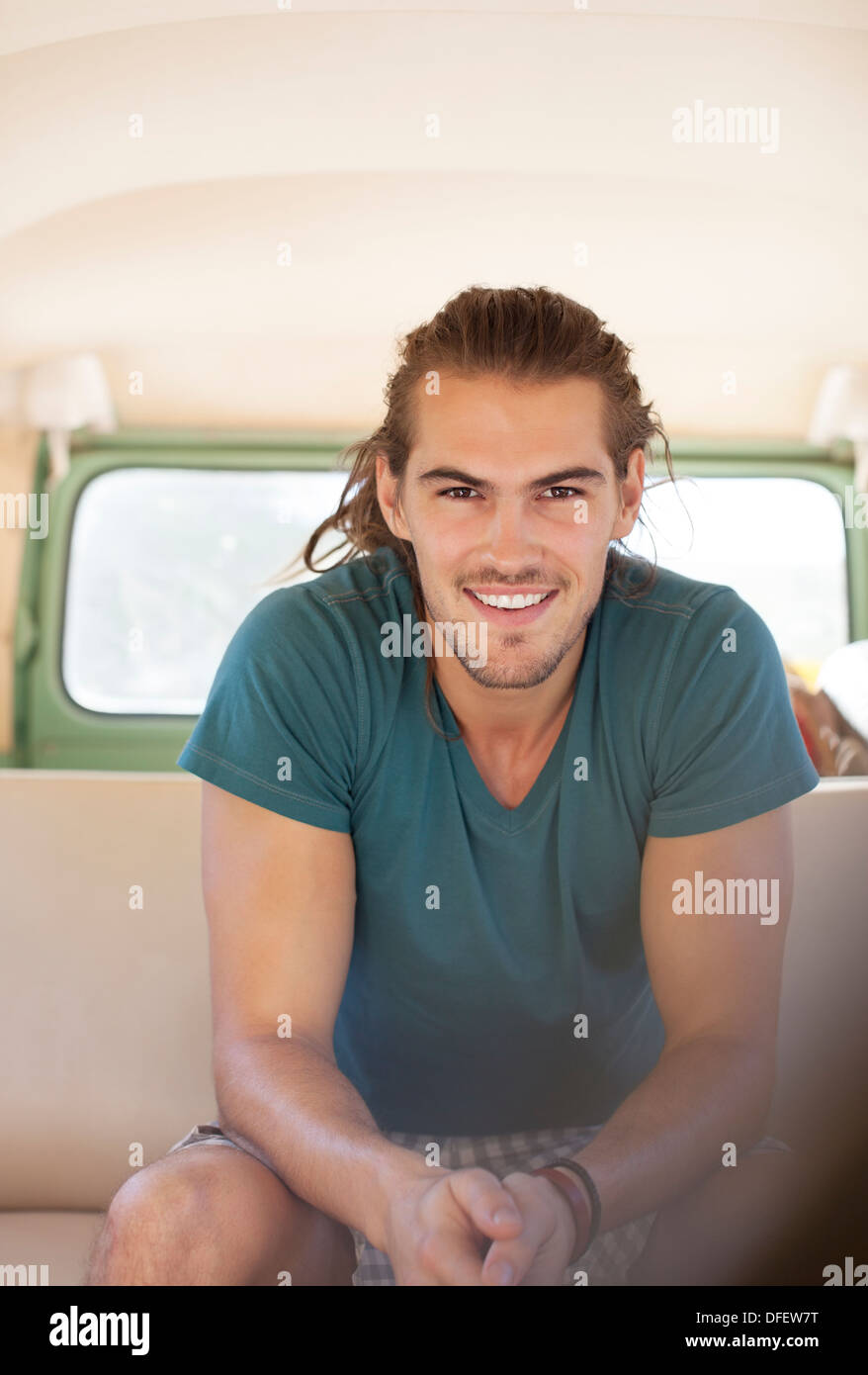 Portrait of smiling man in van Stock Photo - Alamy