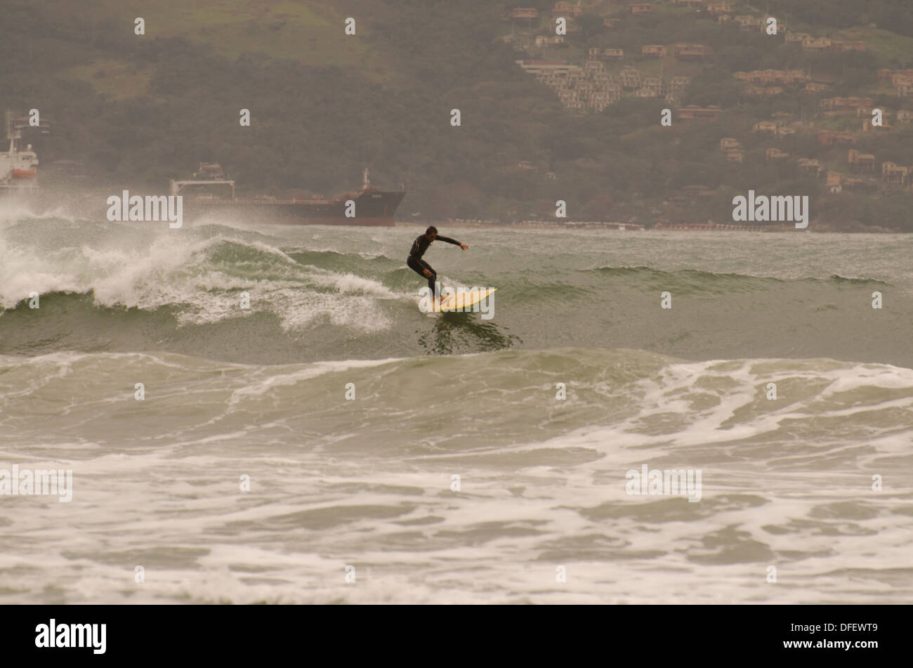 surfboarding at Guaeca beach, north shore of Sao Paulo state, Brazil ...
