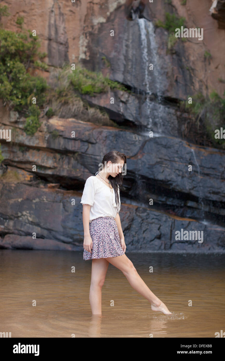 Woman wading in river hi-res stock photography and images - Alamy