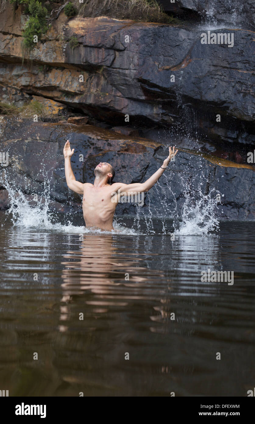 Man Free Standing Arms Up High Resolution Stock Photography and Images ...