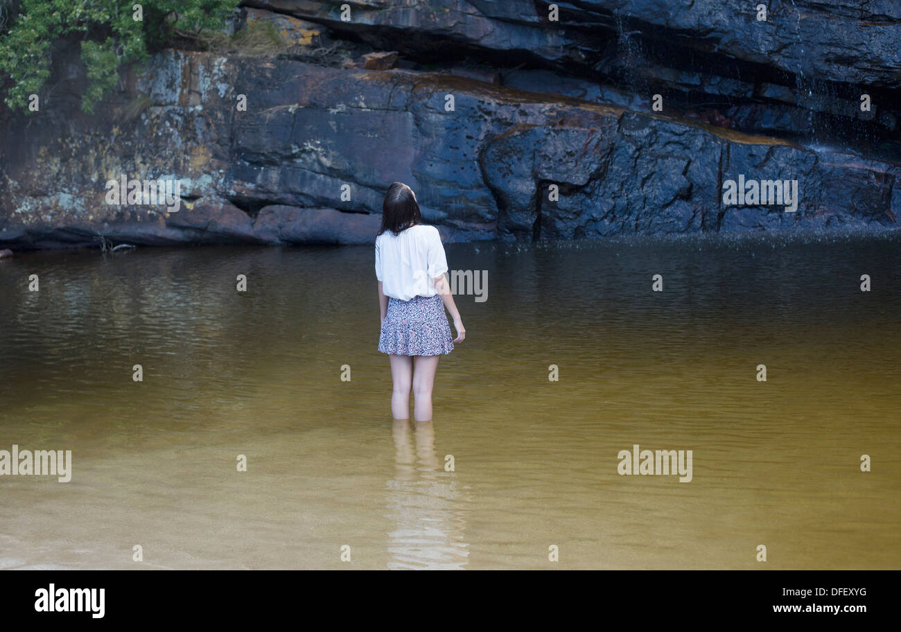 Woman wading in river hi-res stock photography and images - Alamy