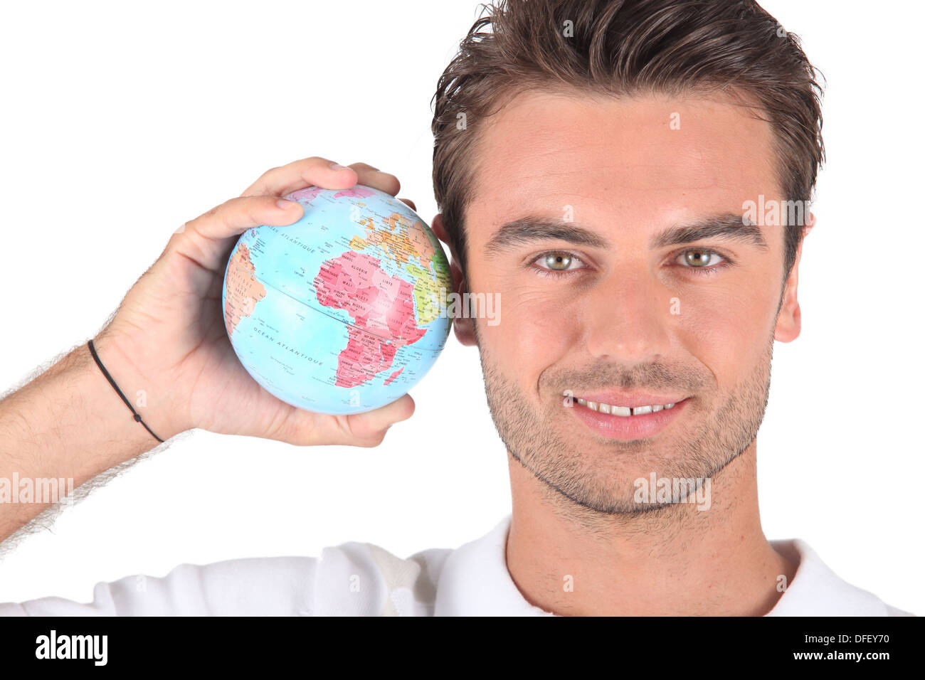 Man holding globe Stock Photo - Alamy
