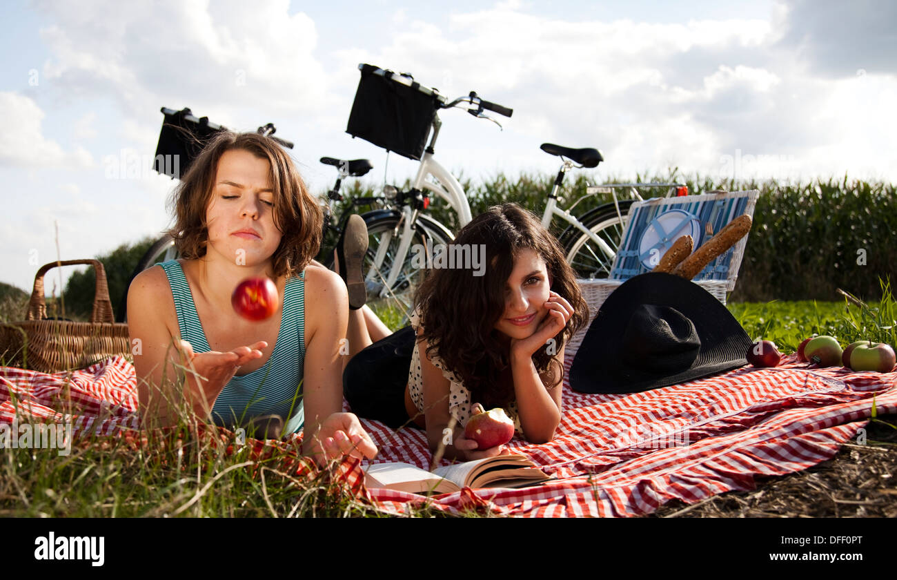 Girls on a picnic Stock Photo - Alamy