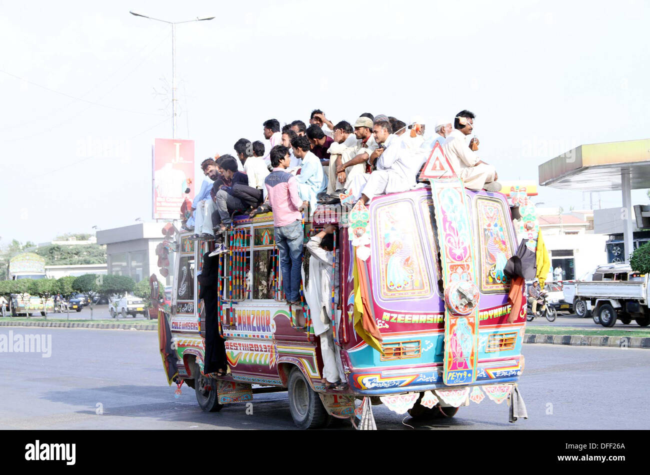 Passengers travelling on an overloaded bus as the short of public ...