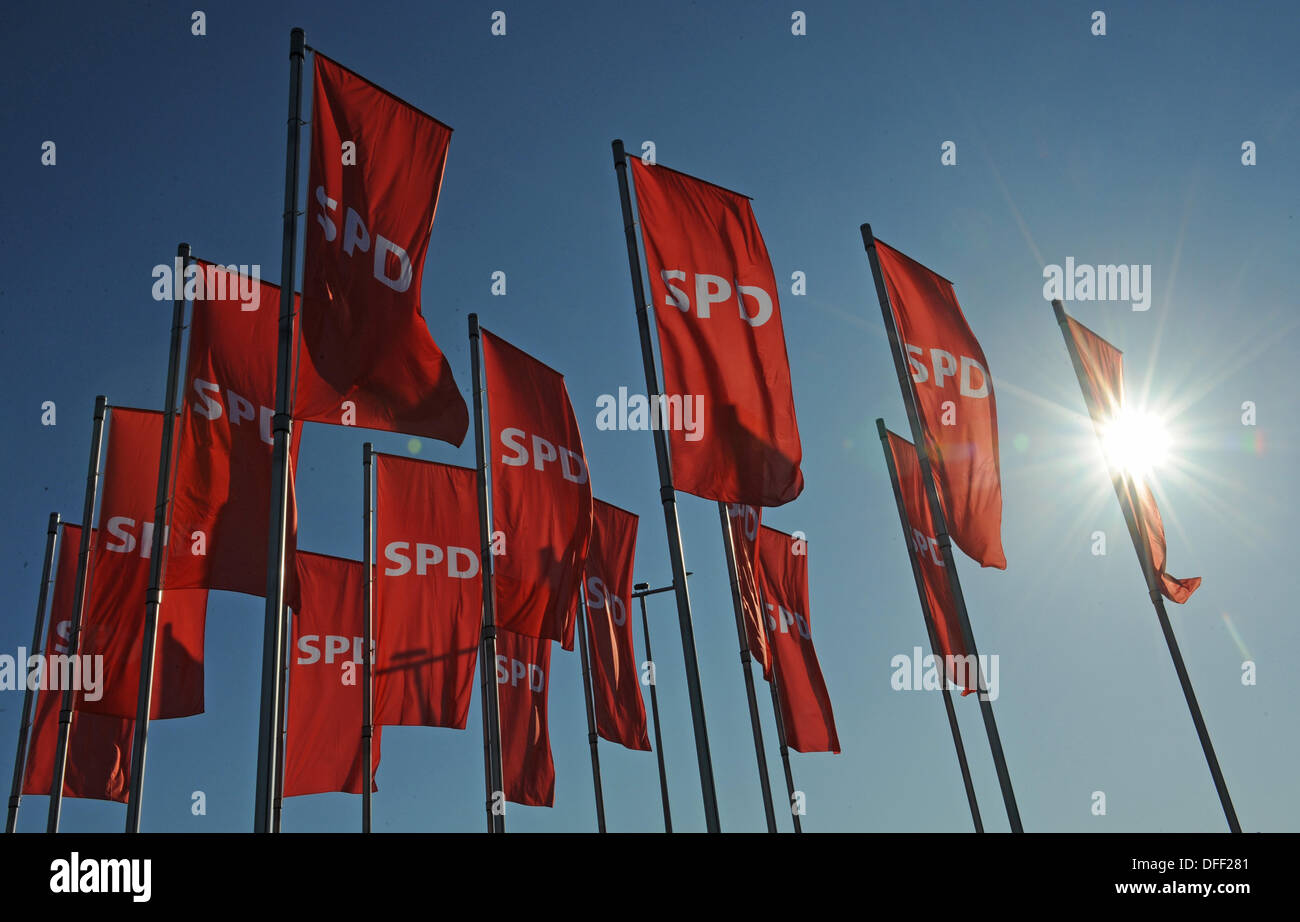 Offenburg, Germany. 14th Oct, 2013. Flags of the SPD wave in front of ...