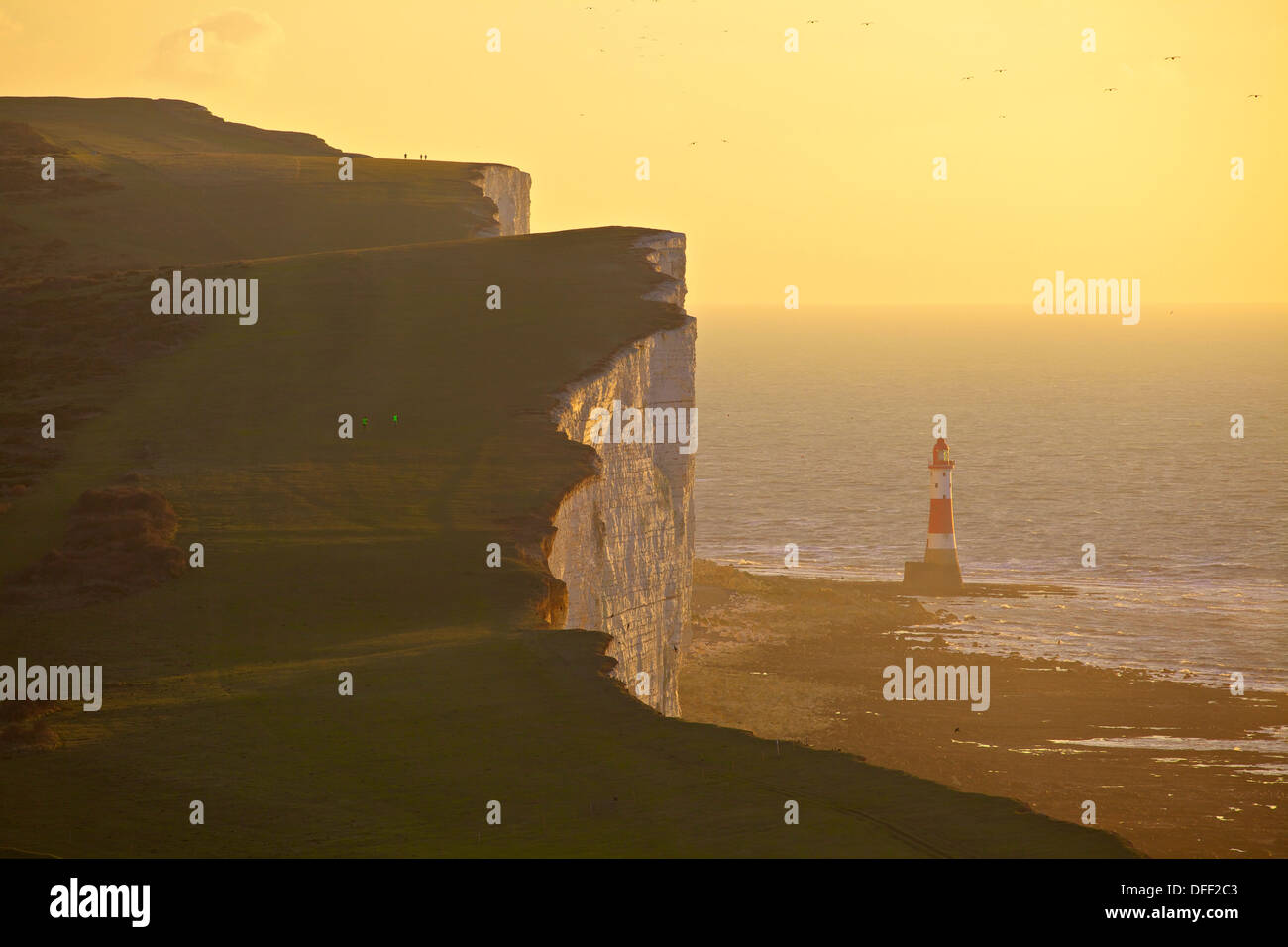 Beachy Head and Beachy Head Lighthouse at Sunset, East Sussex, England ...