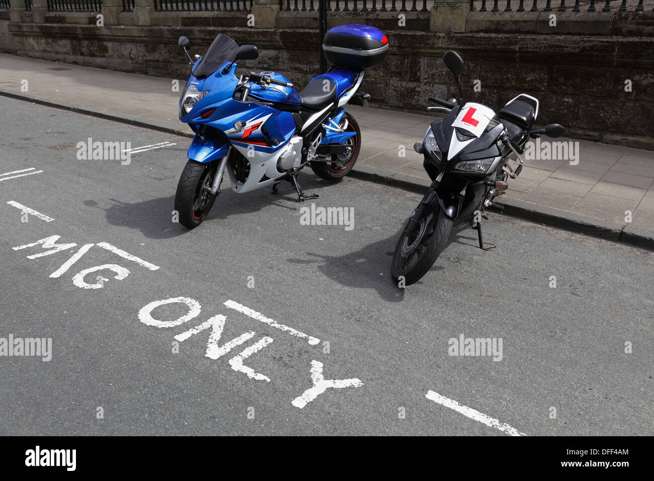 Two motorbike parking bays hi-res stock photography and images - Alamy