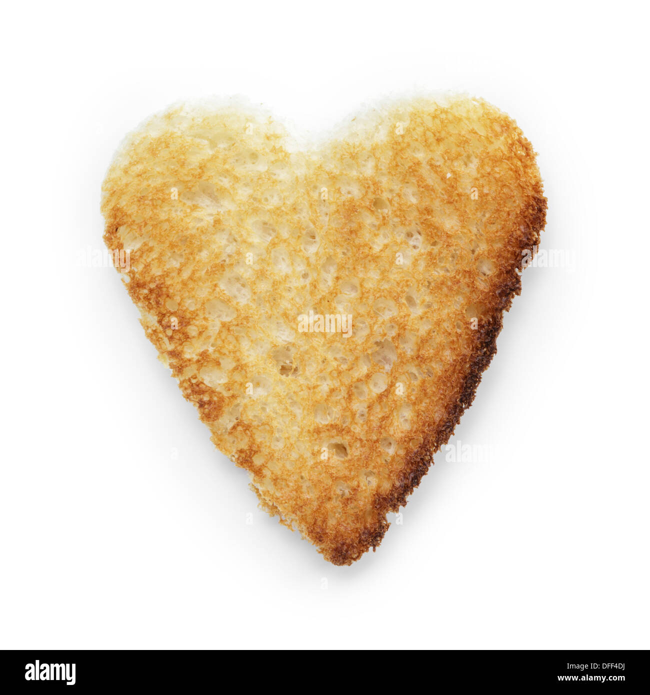 toasted slice of white bread heart shape, on white background with ...