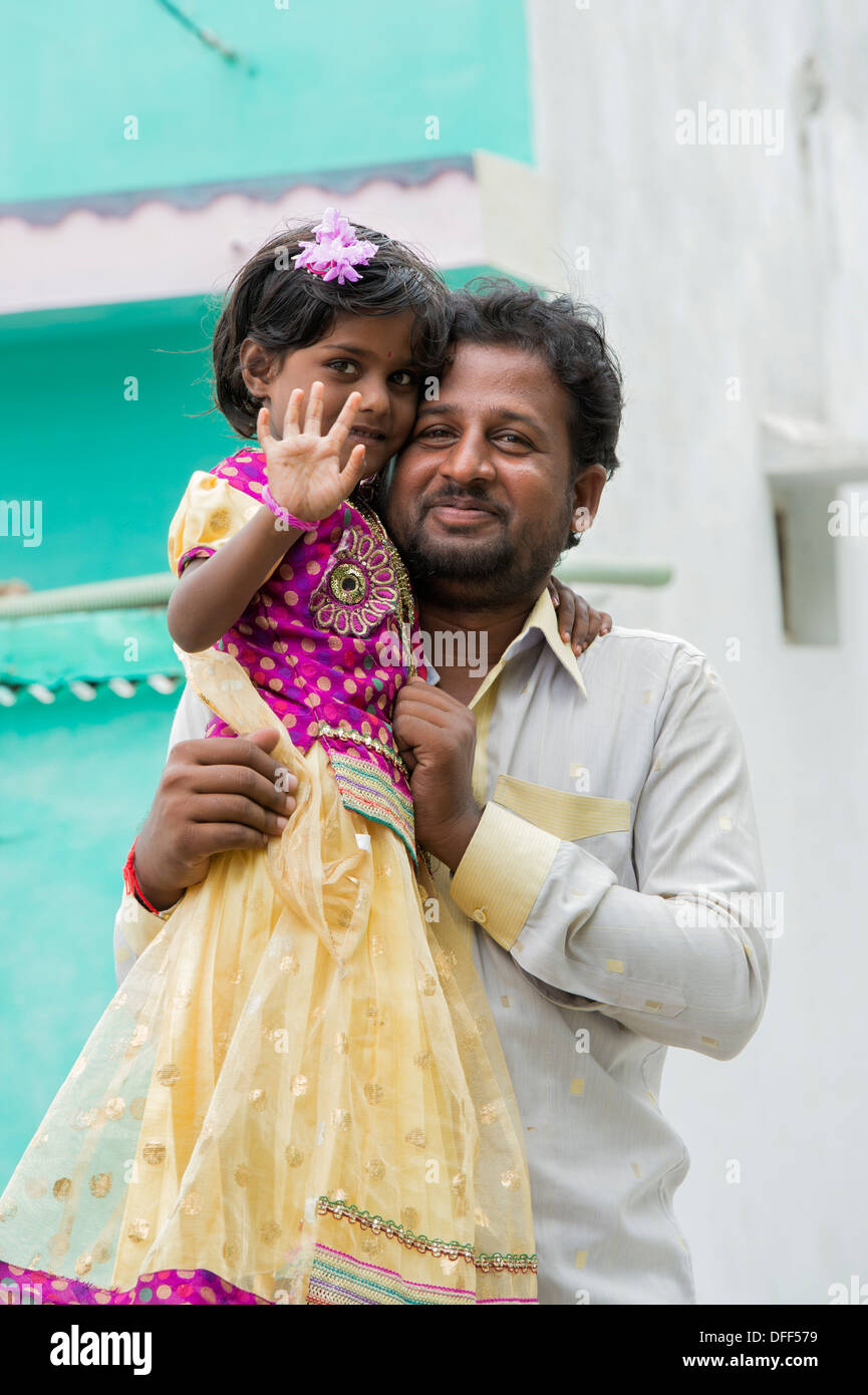 Indian Father and Daughter waving and smiling. Andhra Pradesh, India ...