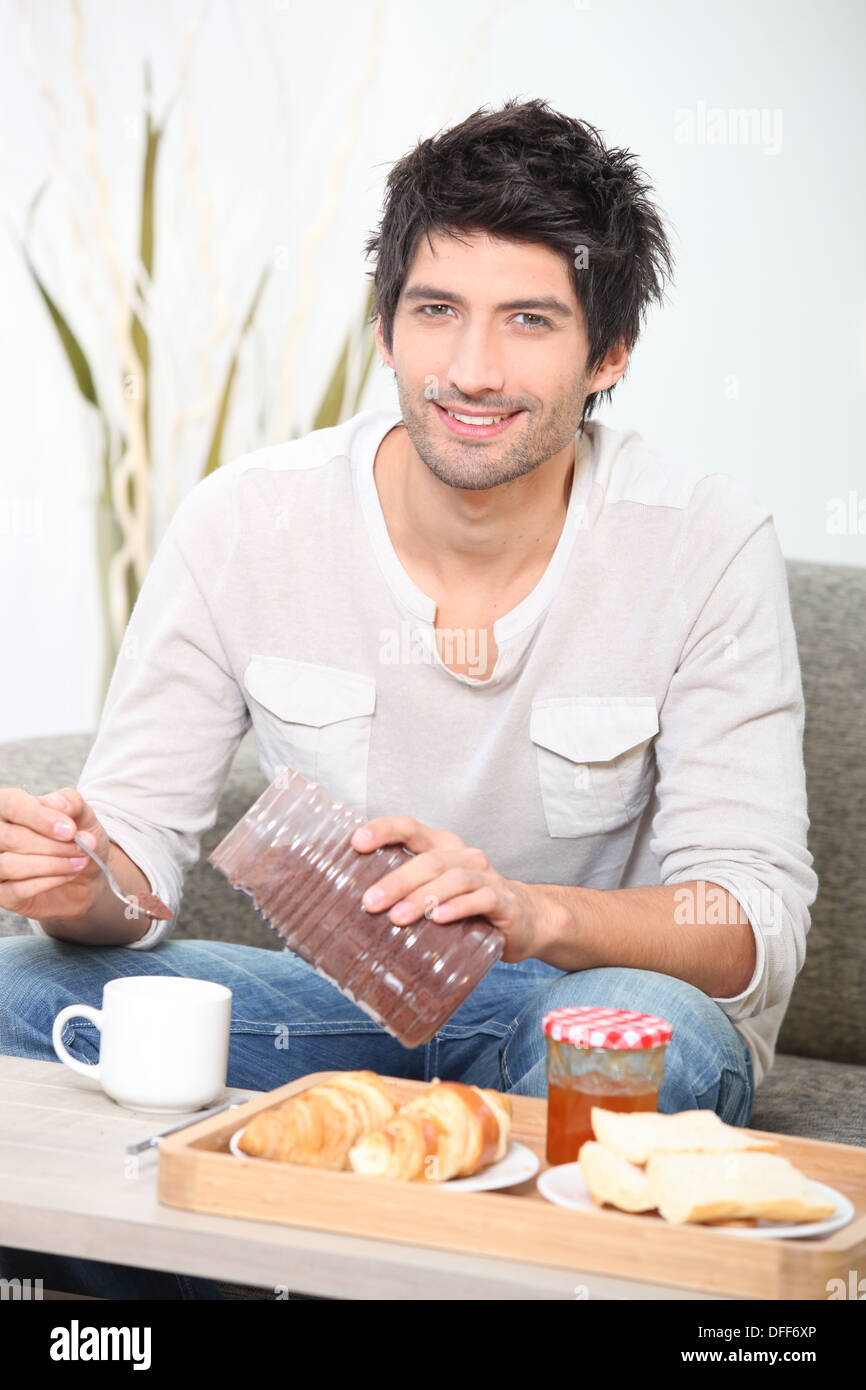 man eating breakfast Stock Photo - Alamy