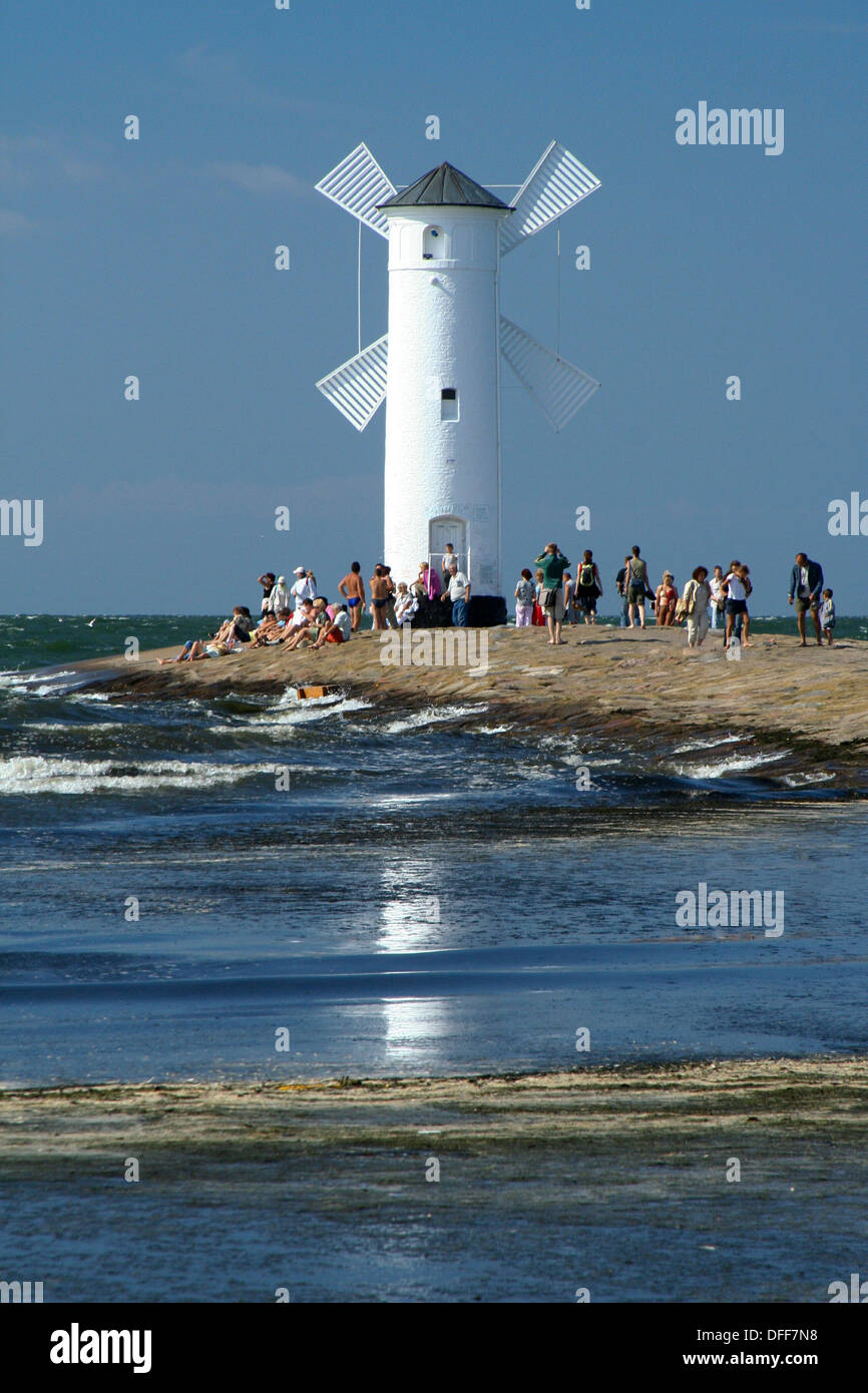 Windmill that is also a lighthouse at the entry to the port of ...