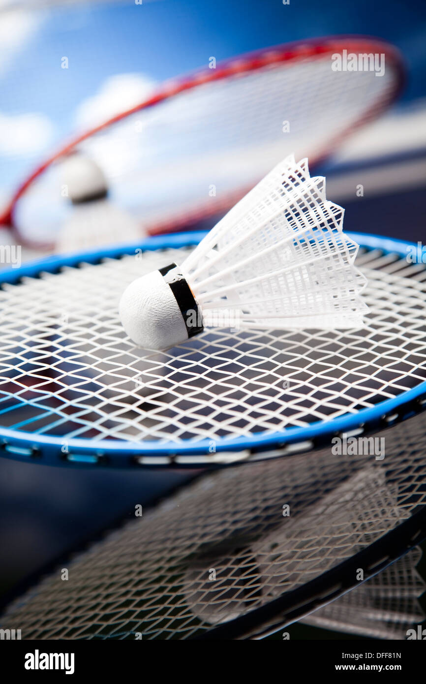 Shuttlecock on badminton racket Stock Photo - Alamy