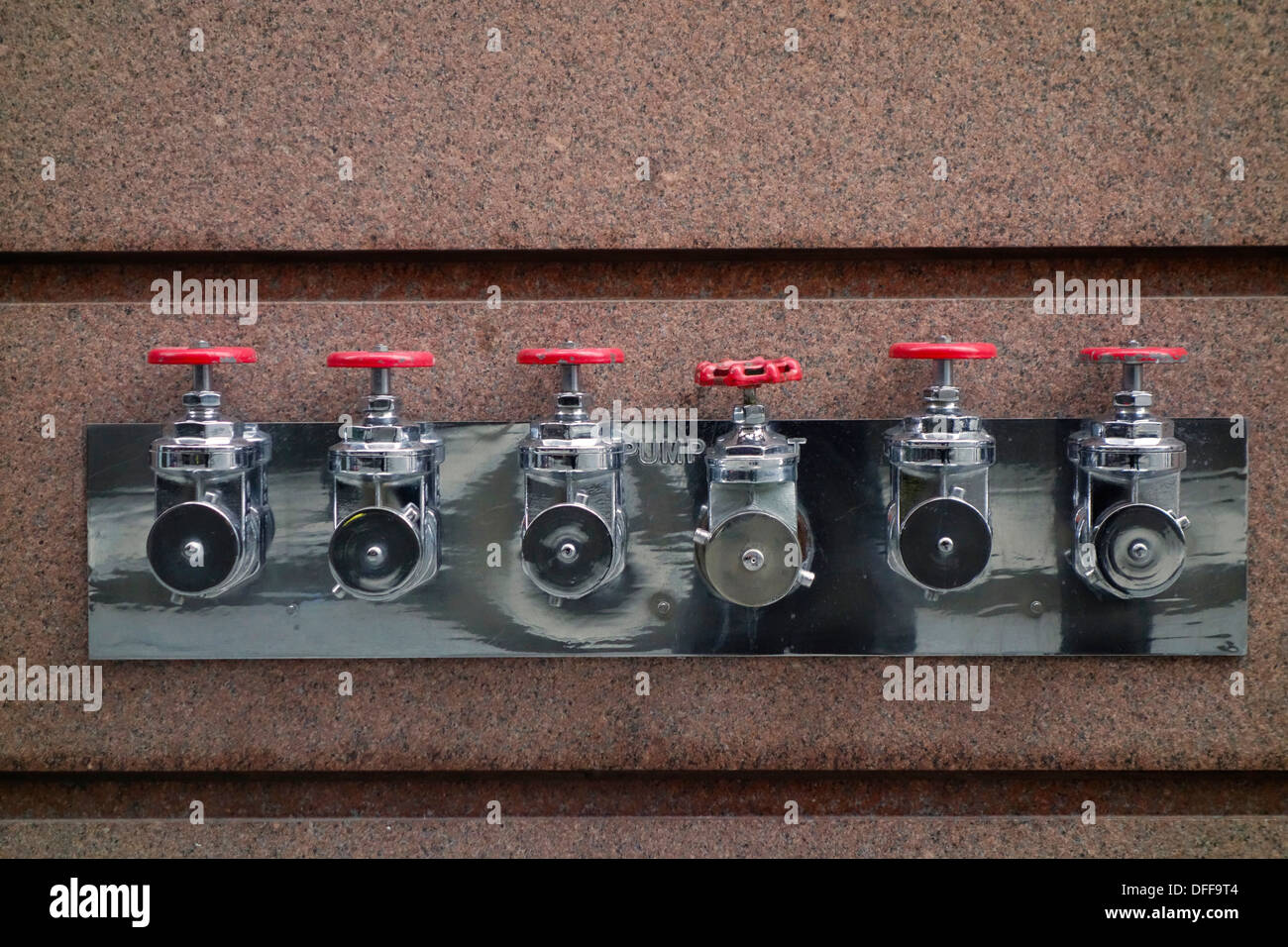 row of standpipes on building Stock Photo - Alamy