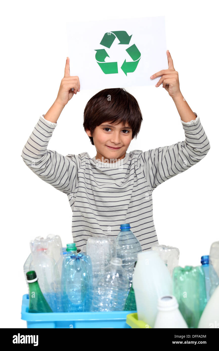 Little boy recycling plastic bottles Stock Photo - Alamy