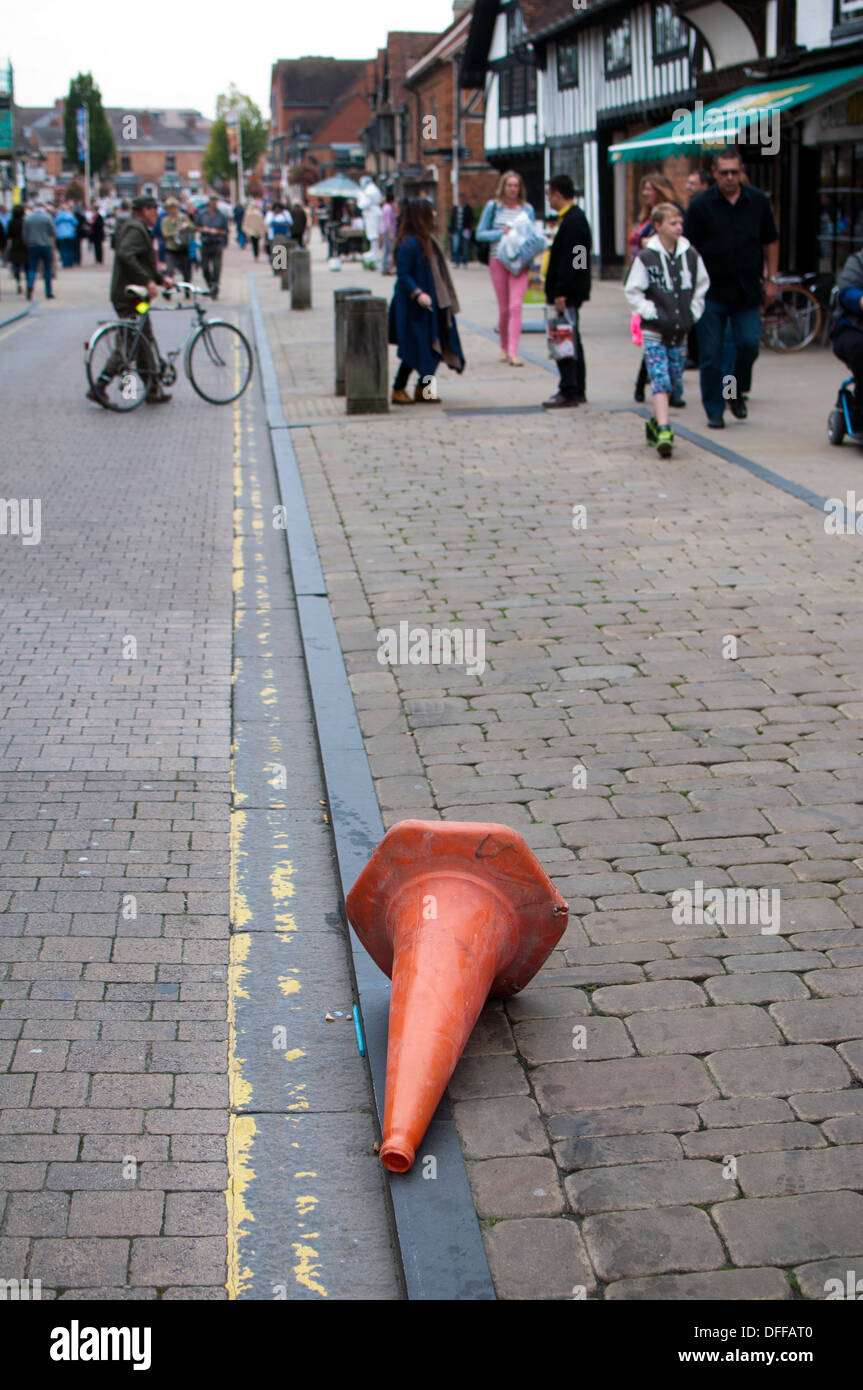 Knocked over traffic cone Stock Photo - Alamy