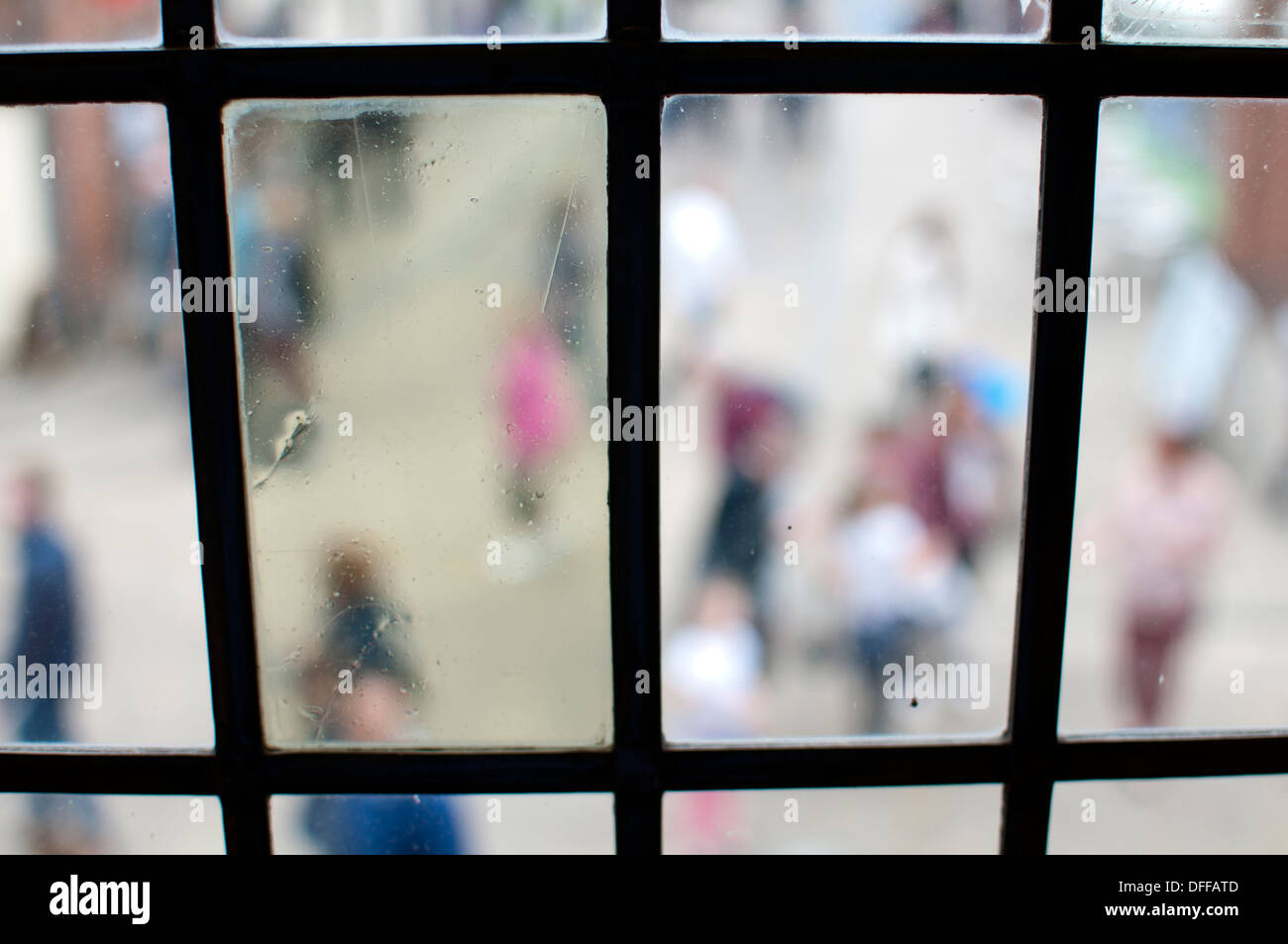 Out of focus people through a leaded window Stock Photo - Alamy