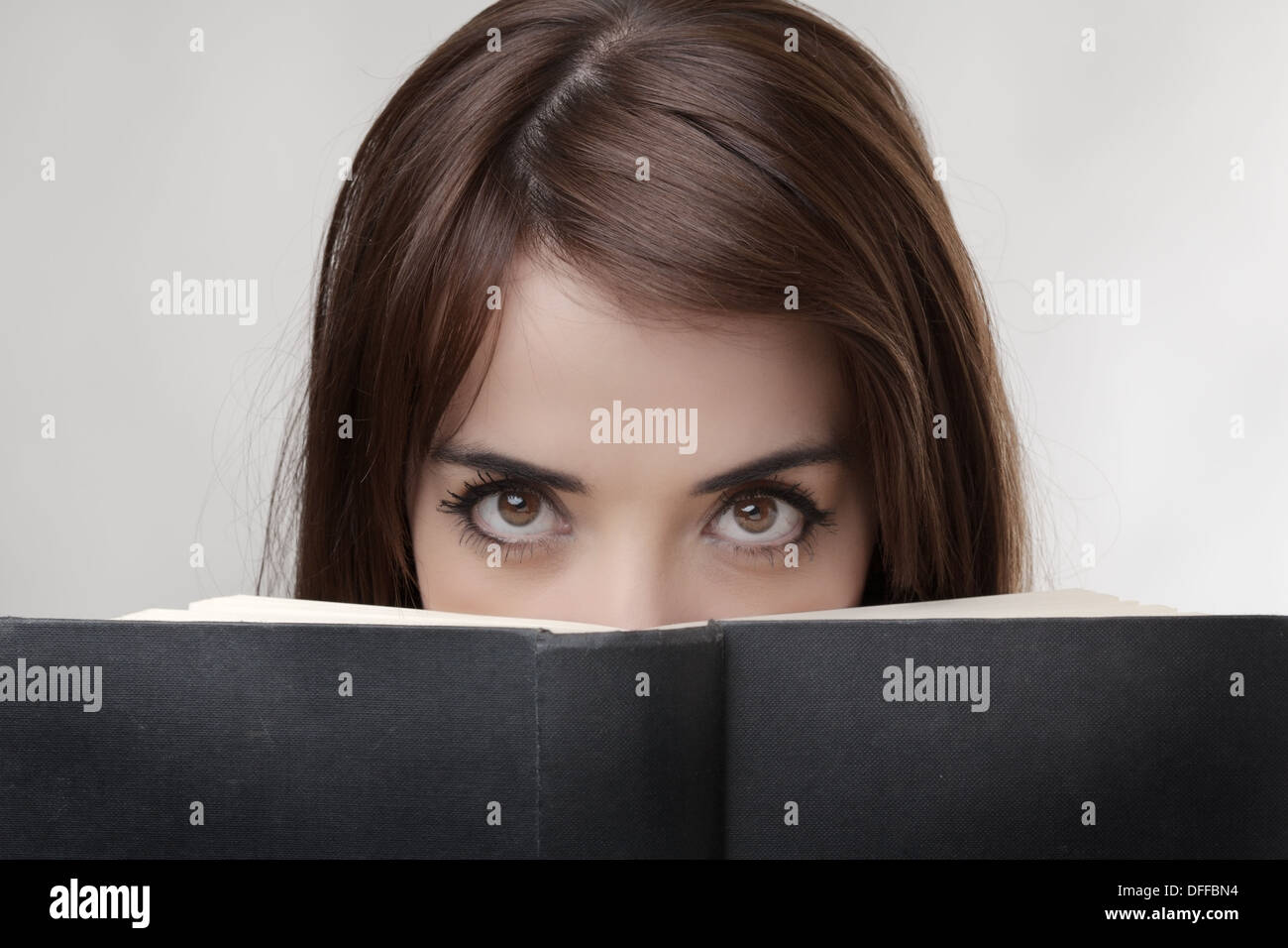 Peering eyes hi-res stock photography and images - Alamy