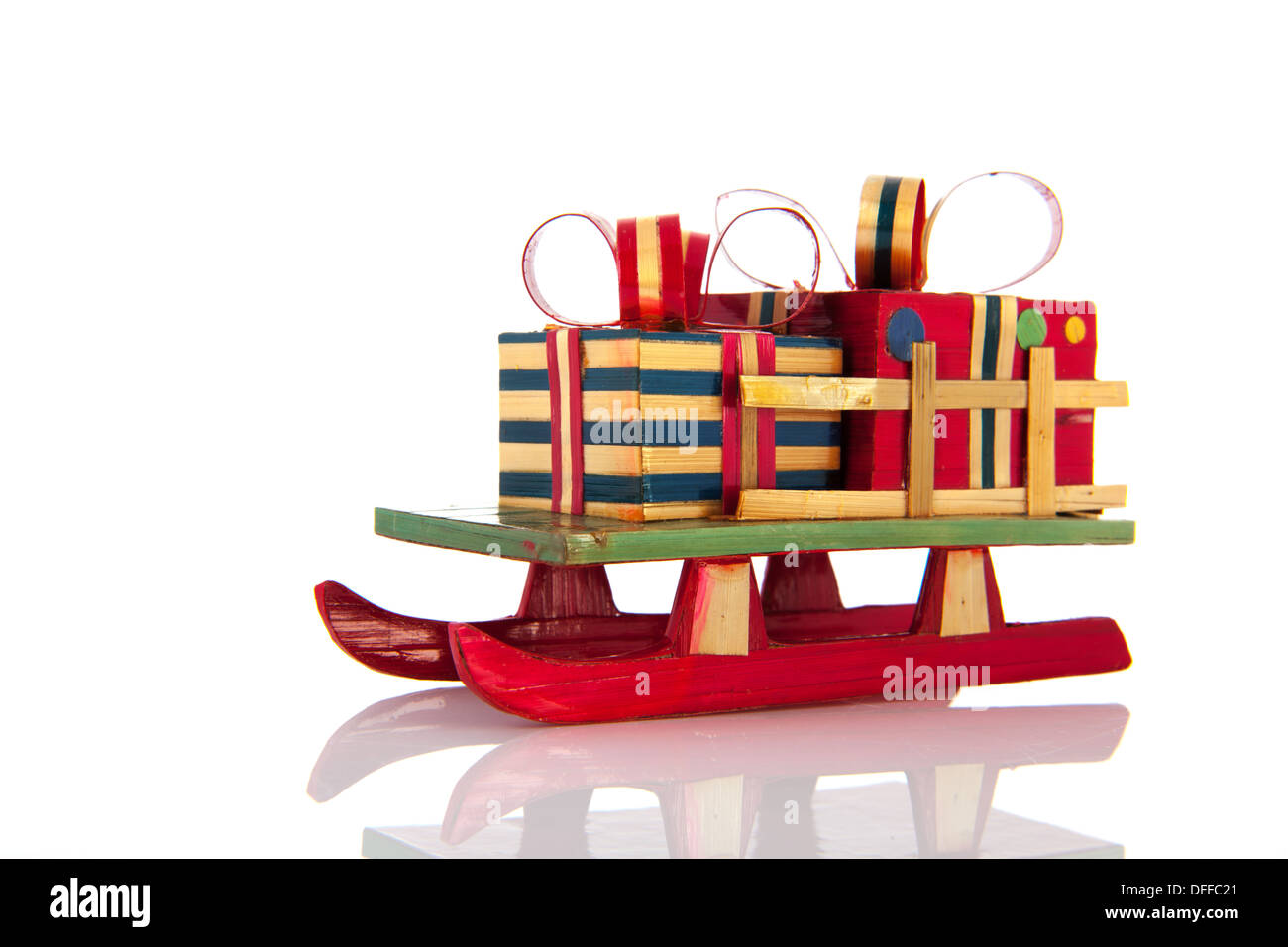 Straw Christmas sledge isolated over white background Stock Photo - Alamy
