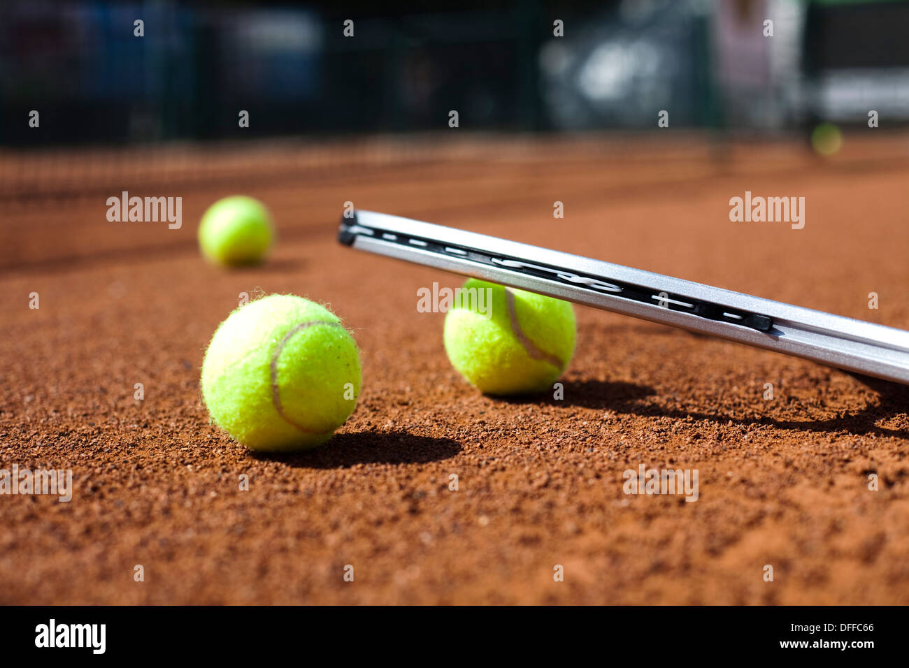 Tennis racket and balls, tennis court Stock Photo - Alamy