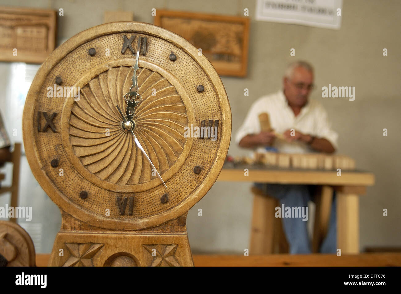 Wood carved clock hi-res stock photography and images - Alamy