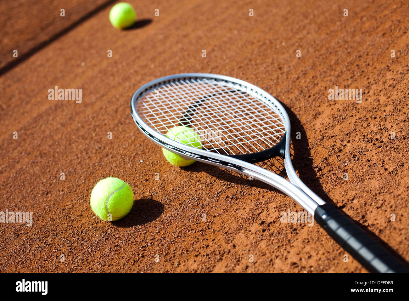 Tennis racket and balls, tennis court Stock Photo - Alamy